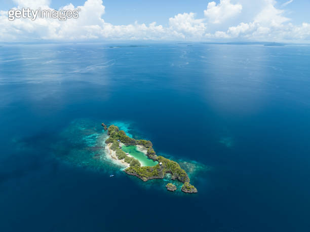 Aerial of Scenic Rufas Island in Raja Ampat (1800715543) - 게티이미지뱅크