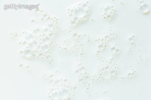 macro milk texture,White surface of milk and bubbles and ripples from ...