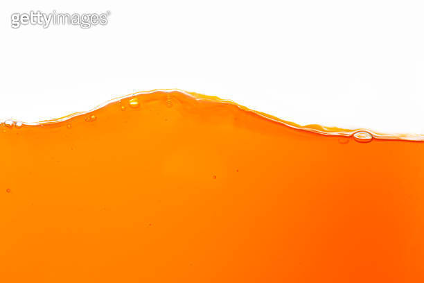 orange juice texture on white background,Close up bright orange juice ...