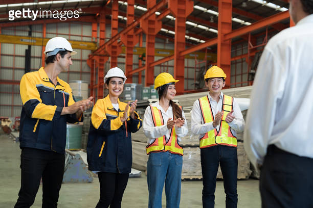 Manufacturing industrial factory concept. Group of male and female ...