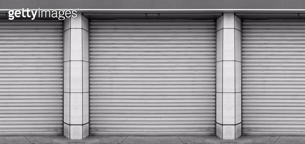 Steel shutter door of warehouse, storage or storefront for closed metal ...