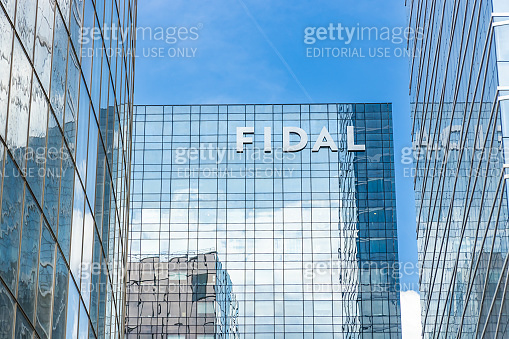 Top of the Tour Prisma with Fidal name on the wall, a tower in La ...