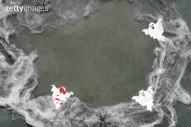 Spooky Halloween Composition: Ghosts, Spiders, and Webs on a Black ...