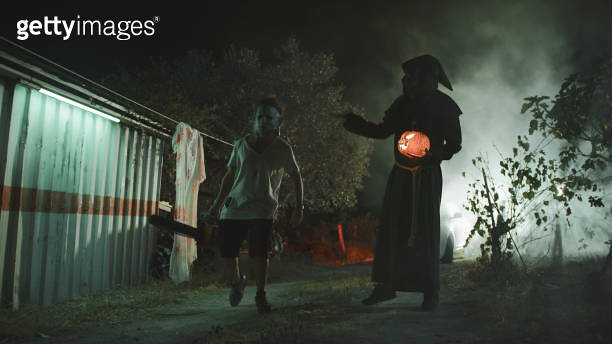 Monk And Monster Together In The Dark night 이미지 (1727369553) - 게티이미지뱅크