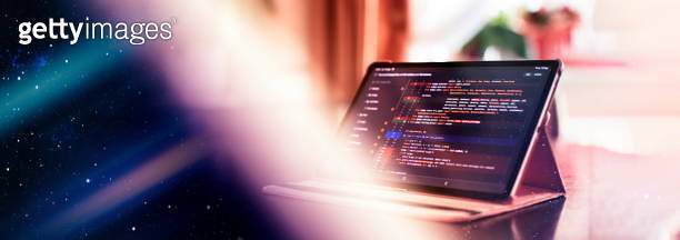 Notebook closeup photo. CSS, JavaScript and HTML usage. Monitor closeup ...