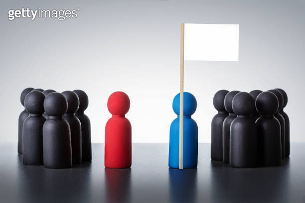 Two opposing groups of people. Resolution of conflict through ...