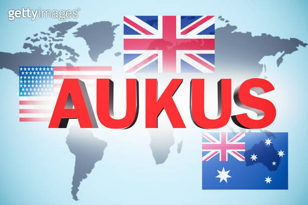 AUKUS security pact. AUKUS word with American, Australian and Britain ...