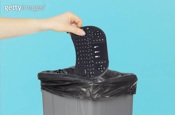 throw the wireless mini keyboard with touchpad into the trash bin, hold ...