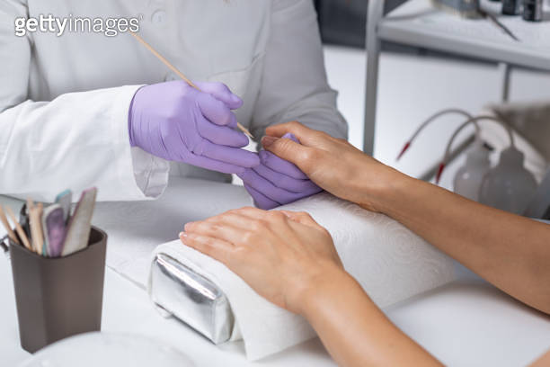 Soothing manicure session with meticulous cuticle pushing and expert ...