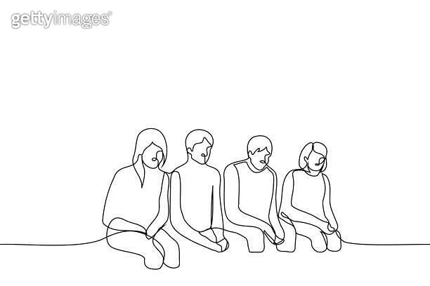 group of young men and women guiltily sitting in a row with their heads ...