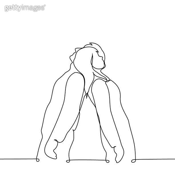 woman and a man standing with their backs to each other, leaning their ...