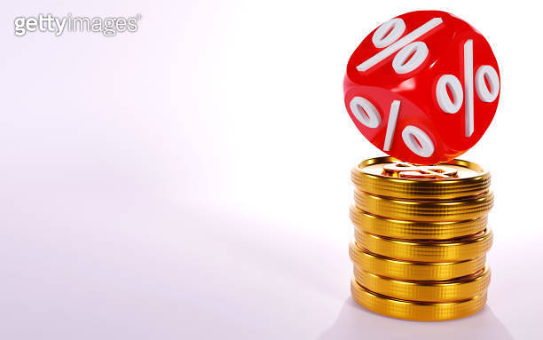 3D rendering of coin stack with red percentage symbol, interest rate ...