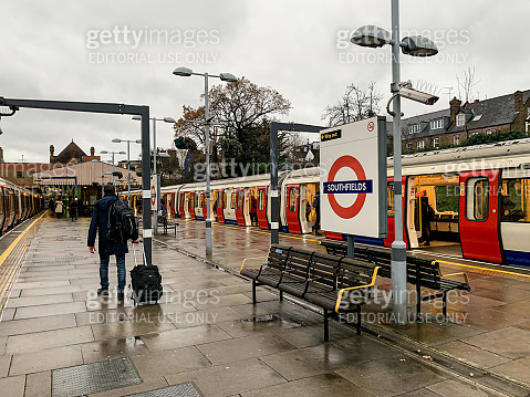 Southfields underground station, District line train to Wimbledon in ...