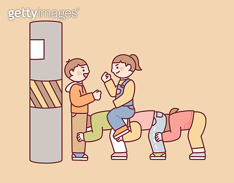 Korean chidhood game. The children are playing stake-driving. Two ...