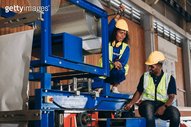 Foreman checking Material or Machine. Industrial worker inspecting and ...