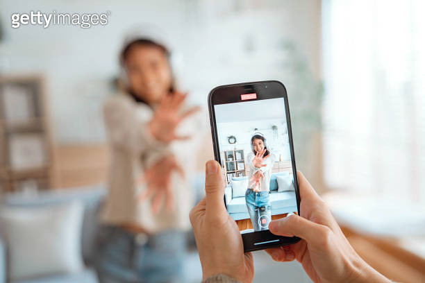 Happy young asian vlogger influencer woman with her friend cover ...