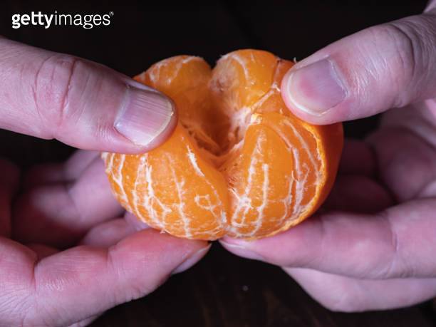 Cross section of sweet Japanese mandarin orange. Delicious fruits that ...