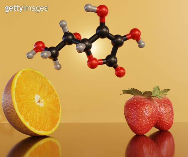 Strawberries and cut in half orange fruit with ascorbic acids molecule ...