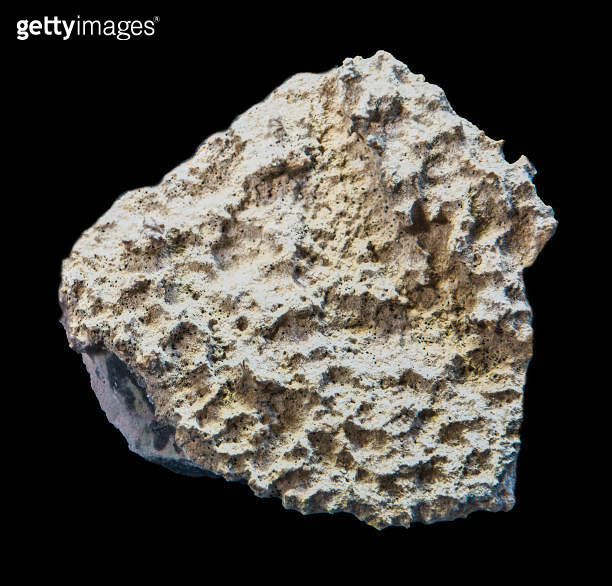 Magnified close up of a rough textured igneous rock. (1721299192) - 게티이미지뱅크