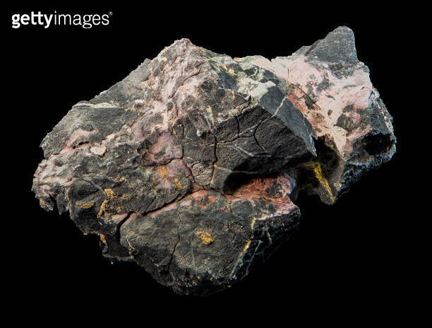 Magnified close up of a fractured metamorphic rock with lavender ...