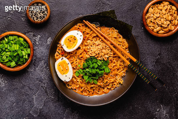 Korean style instant noodle, Shin Ramyeon with peanut and egg ...