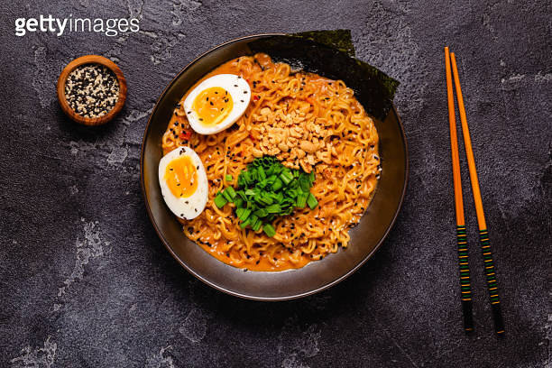 Korean style instant noodle, Shin Ramyeon with peanut and egg ...
