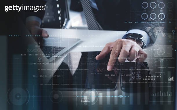 Data analysis, Business Intelligence concept. Businessman using digital tablet with modern ...