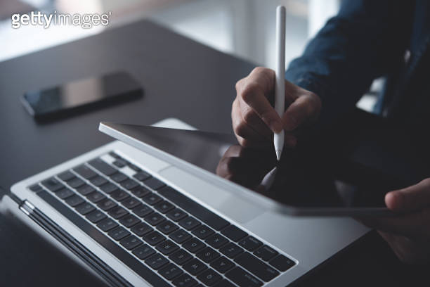 Close up of business woman hand using stylus pen signing on digital ...
