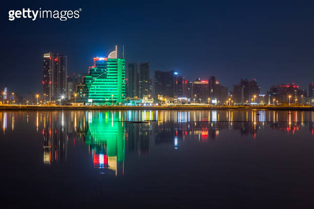 Manama illuminated downtown on the shore of Persian gulf, Manama ...
