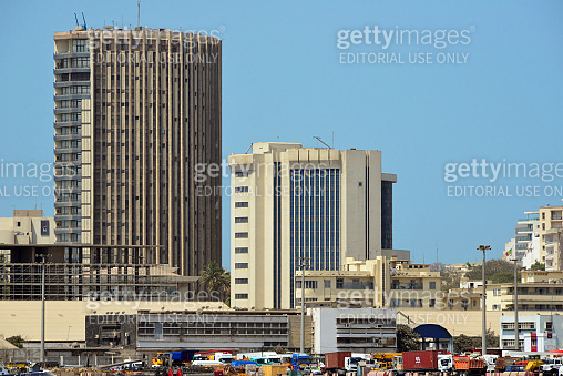 The harbor and the Central Bank of West African States headquarters ...