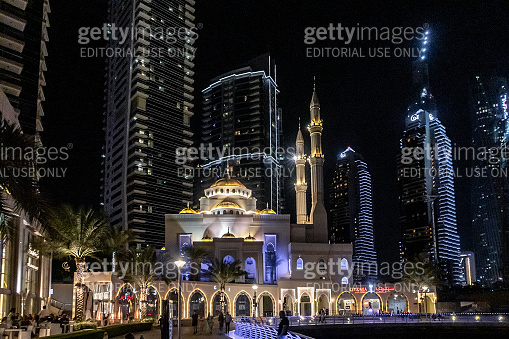 Night view to Mohammad Bin Ahmed Al Mulla mosque on the promenade of ...