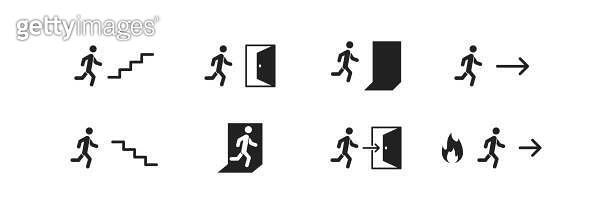 Emergency exit icon set with human figure, doors, stairs and arrows ...