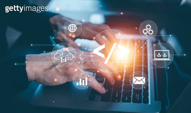 Business people using laptops with Code html and programming on screen ...