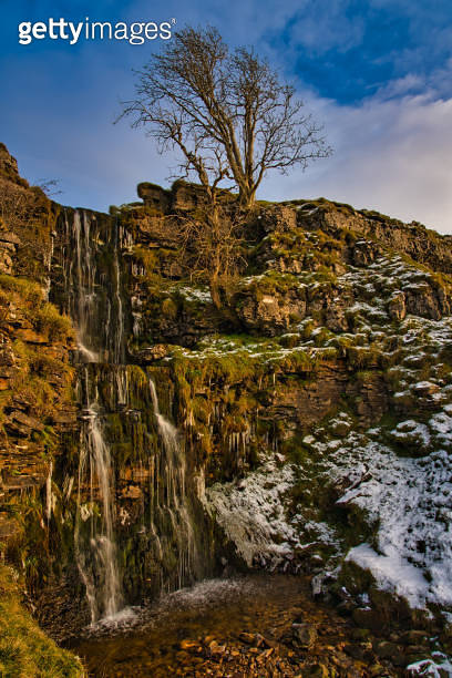 Cray Gill waterfall in wintry conditions and golden sunlight, Cray ...
