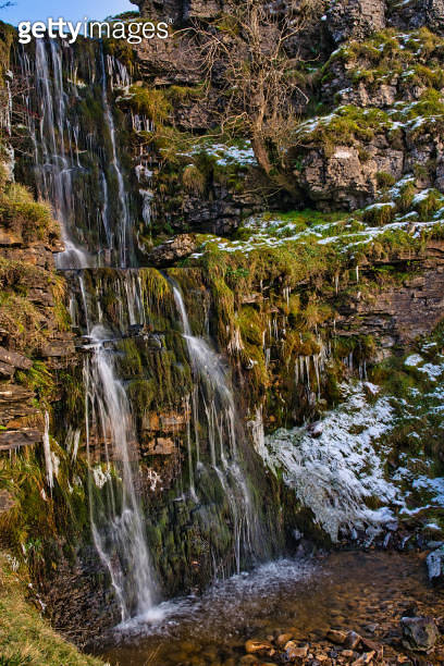 Cray Gill waterfall in wintry conditions and golden sunlight, Cray ...