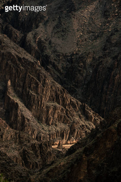 Granite Rapids Sits At The Bottom of The Steep Cliffs Of The Grand ...