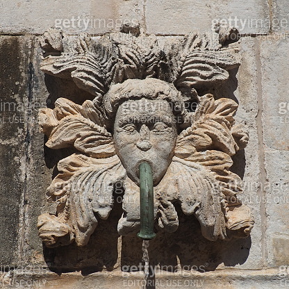 Big fountain of Onofrio. A mascaron is a decorative element in the form ...