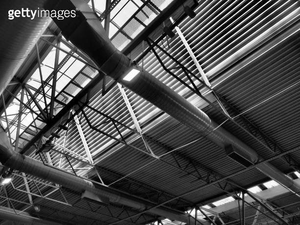 The roof of a hangar, a production hall or a sports hall. Metal ...