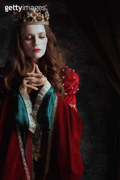 medieval queen in red dress with white makeup and crown (1620661595 ...