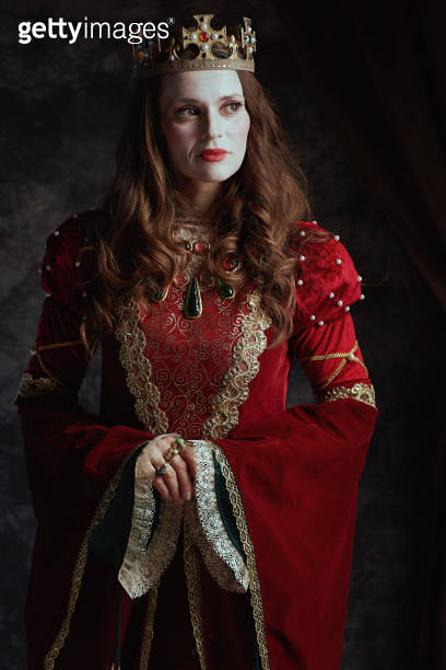 medieval queen in red dress with white makeup and crown (1830734792 ...