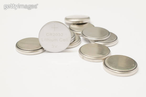 lithium batteries on white background. lithium cell, the precious metal ...