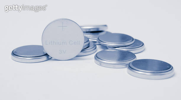 lithium batteries on white background. lithium cell, the precious metal ...