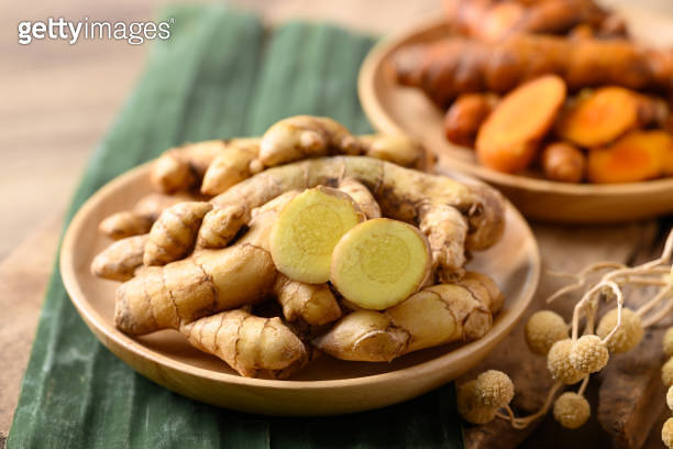 Fresh turmeric white and yellow color, Spice in Asian cuisine ...