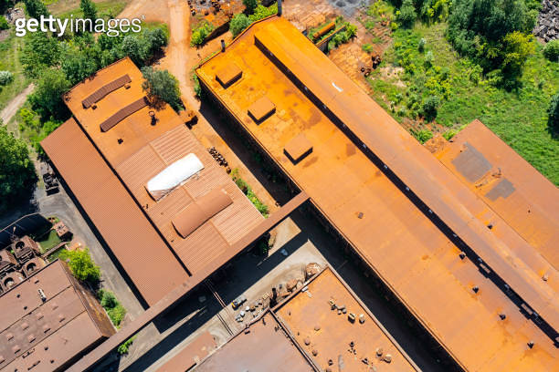 Industrial. Aerial view of large roof of old metalurgic factory. Drone ...