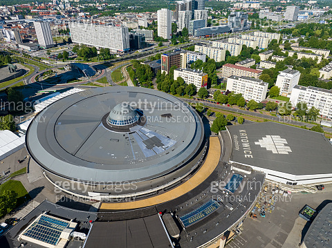 Aerial photo of “Spodek” arena complex and modern city center of ...