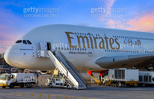 Main International Dubai Airport, Emirates airline terminal with planes ...