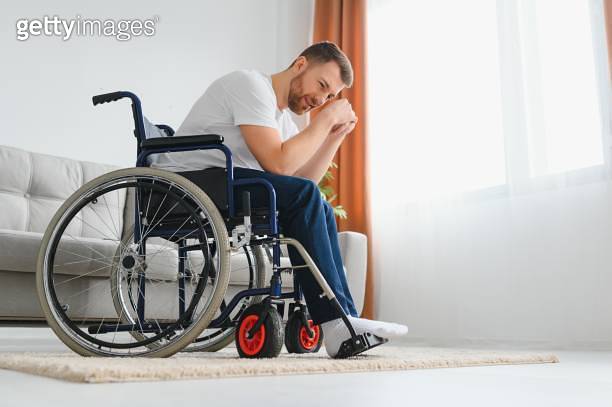 Depression and loneliness in disabled man. Elderly man in wheelchair ...