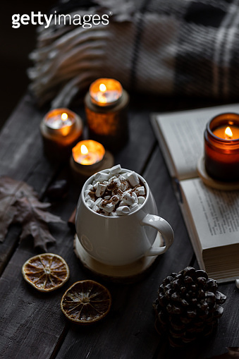 Autumn cozy home composition with hot chocolate with marshmallow and ...