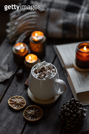Autumn cozy home composition with hot chocolate with marshmallow and ...