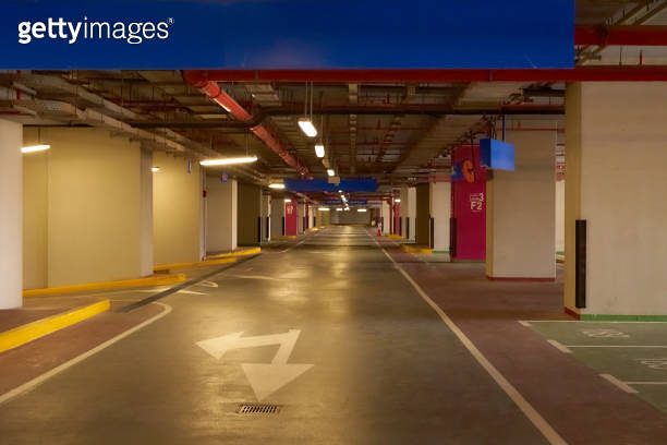 interior of underground parking in a high-rise building (1804470389 ...